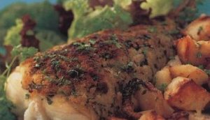 Sea Fish Baked with Potatoes in the Oven